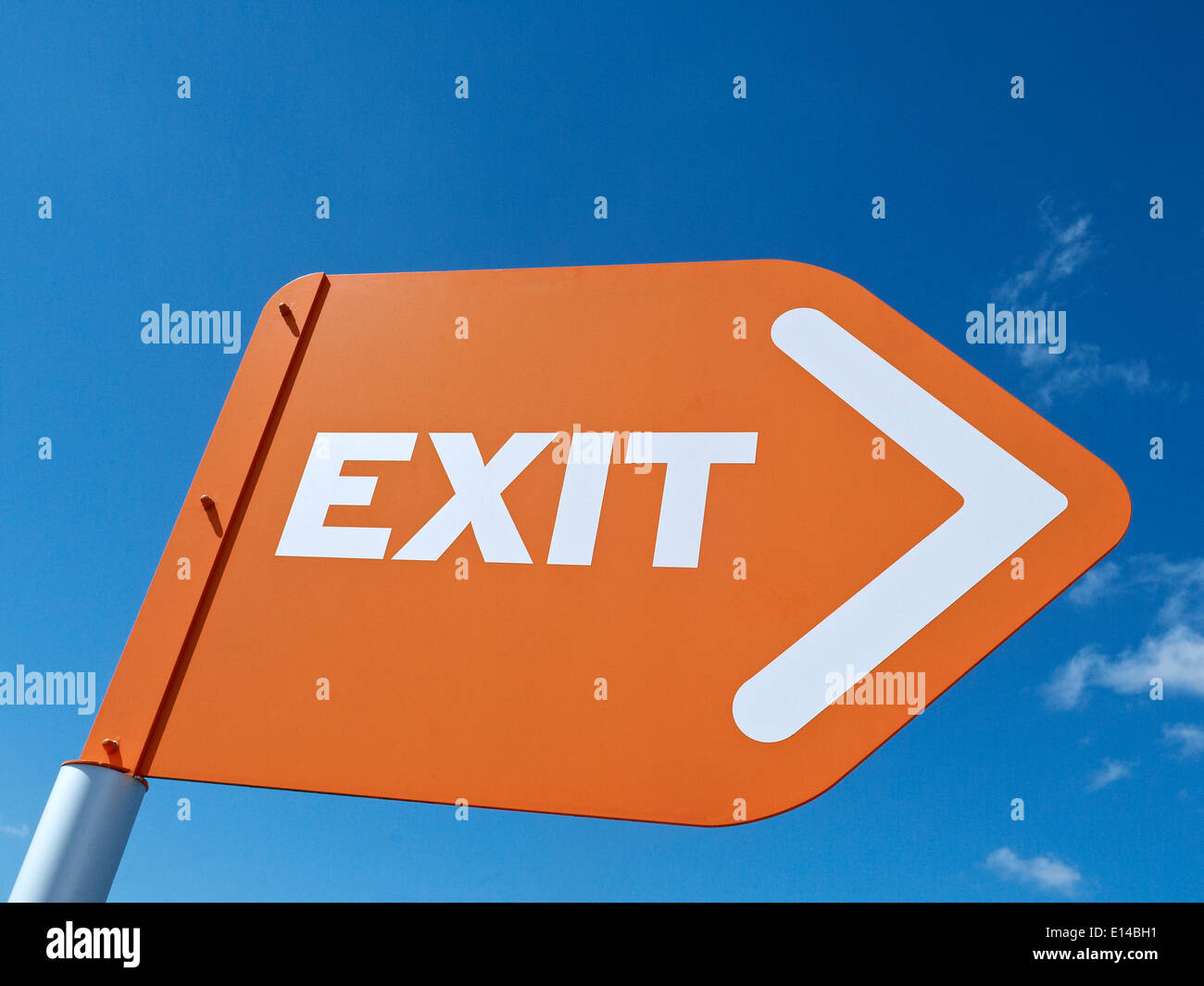 Exit sign isolated against blue sky UK Stock Photo - Alamy