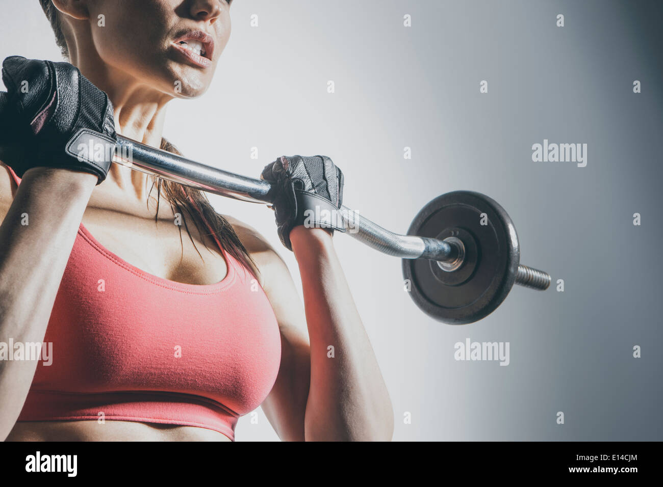 Female lifting barbell High Resolution Stock Photography and Images - Alamy