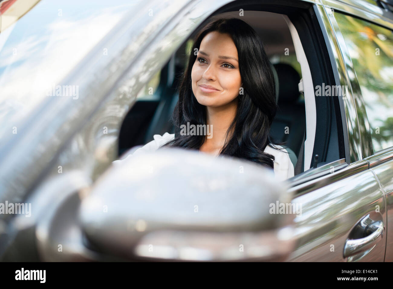 Young black woman driving hi-res stock photography and images - Alamy