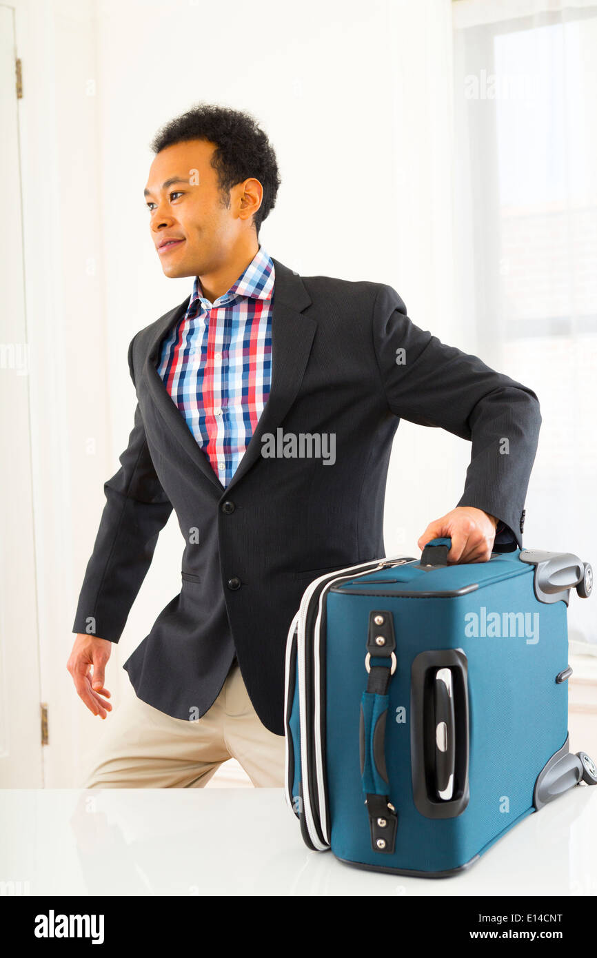 Person leaving new york city suitcase hi-res stock photography and ...