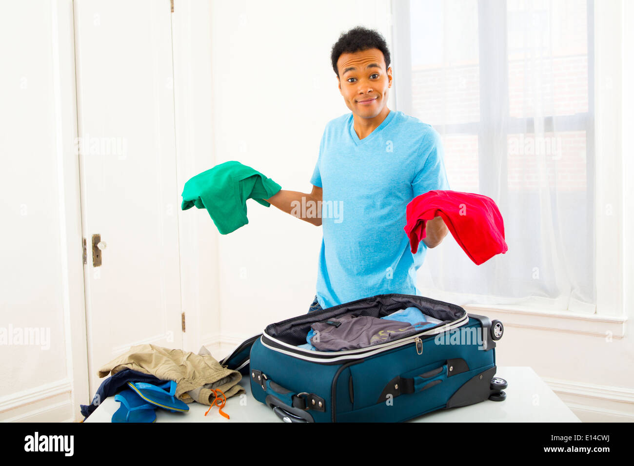Black Man Holding Suitcase High Resolution Stock Photography and Images ...