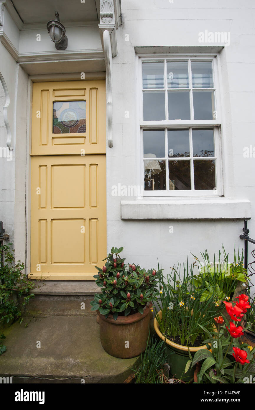 Old country cottage in english rural village with front door Stock ...