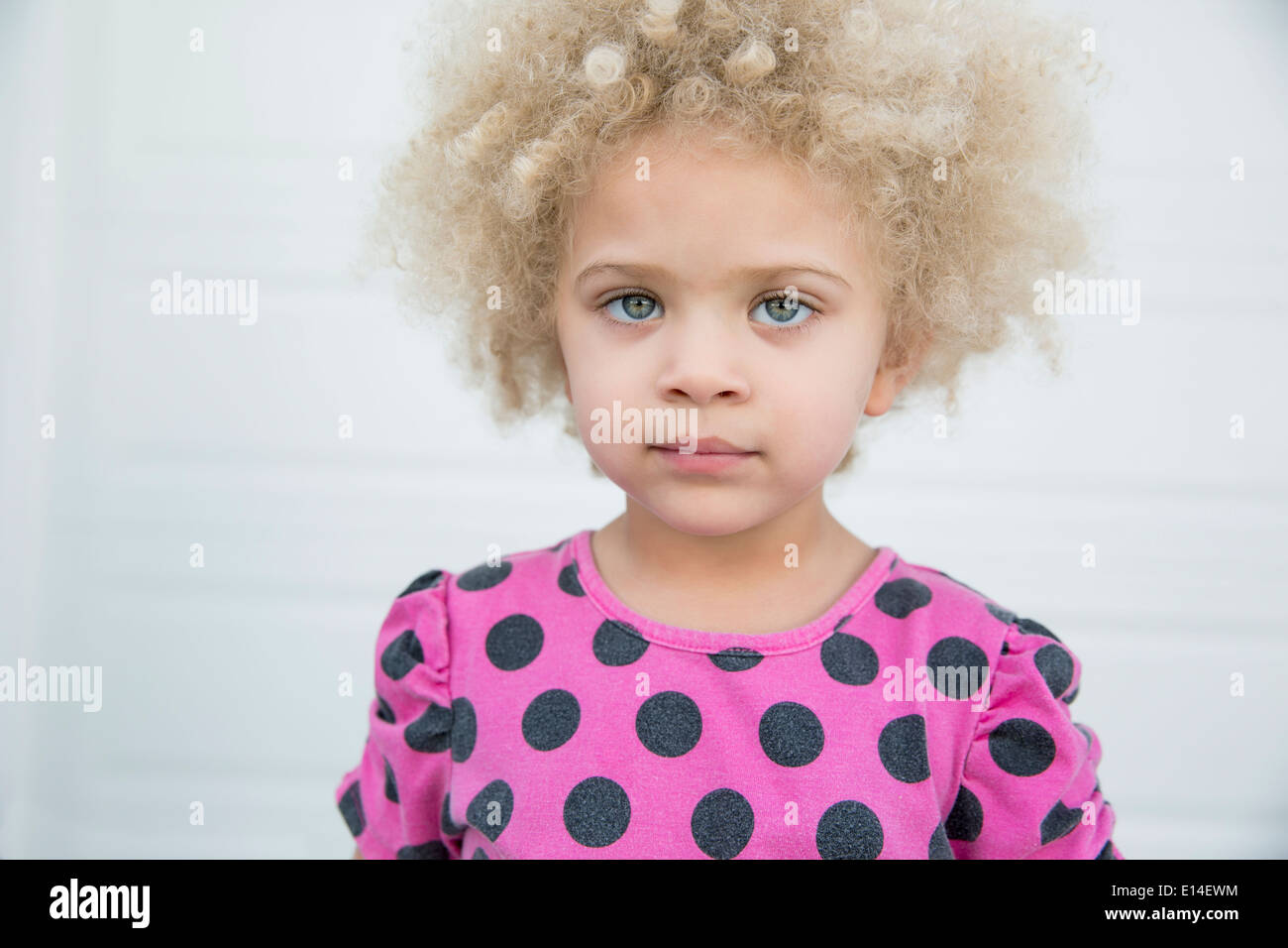 Mixed race girl standing outdoors Stock Photo - Alamy