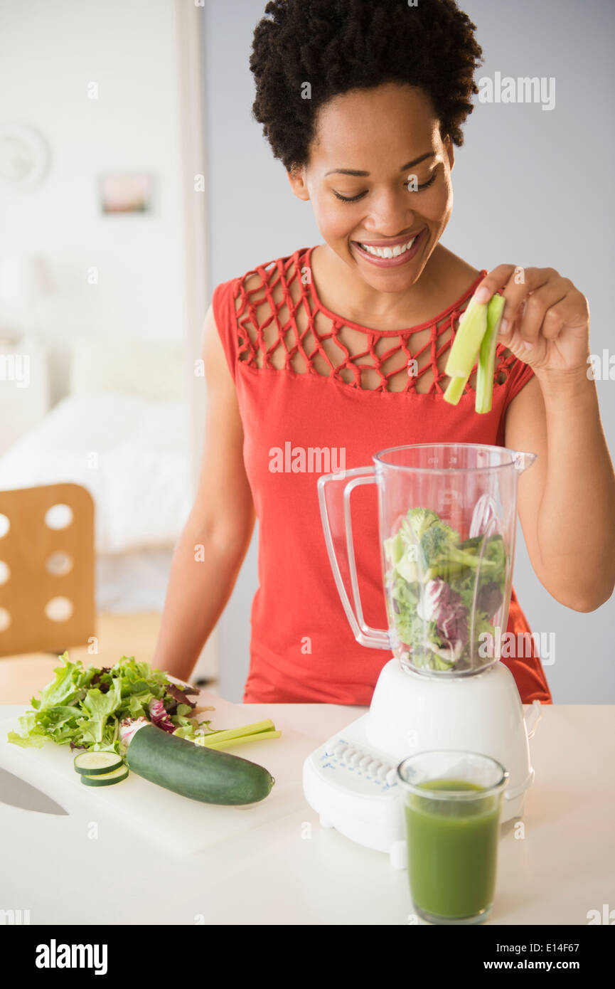 Woman making smoothie in hi-res stock photography and images - Alamy