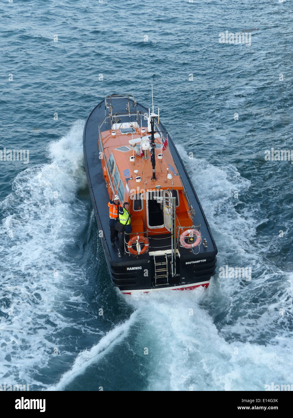 Pilot boat next to cruise ship in Mediterranean Sea Stock Photo - Alamy