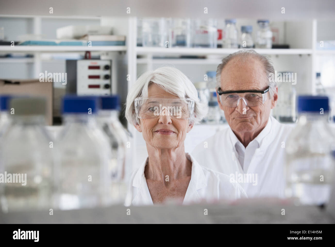 Senior Caucasian scientists smiling in lab Stock Photo - Alamy