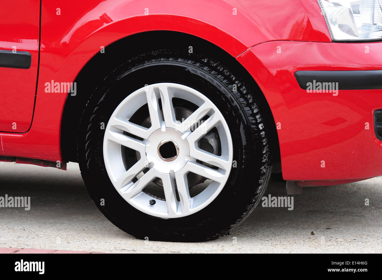 An alloy wheel on a Fiat Panda, 2012 model Stock Photo - Alamy