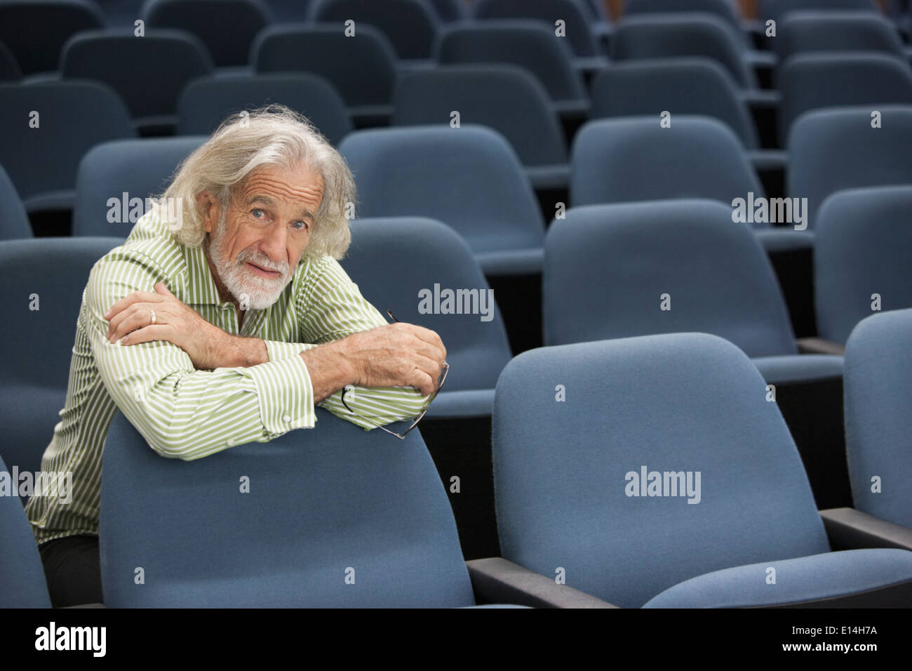 Student sitting lecture hall holding hi-res stock photography and ...
