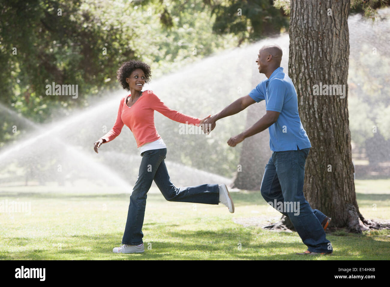 Man running looking over shoulder hi-res stock photography and images ...