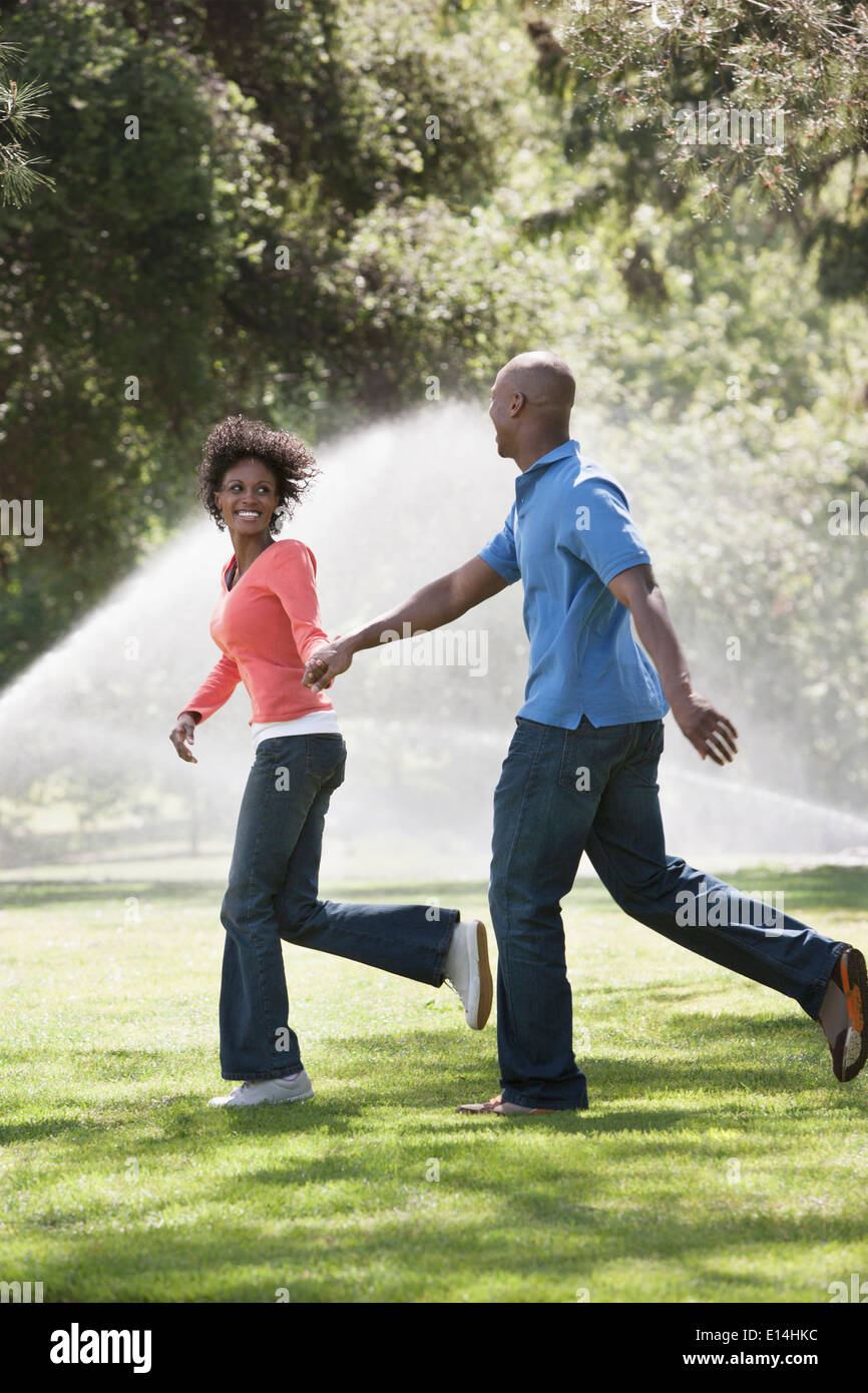 Man looking over shoulder running hi-res stock photography and images ...