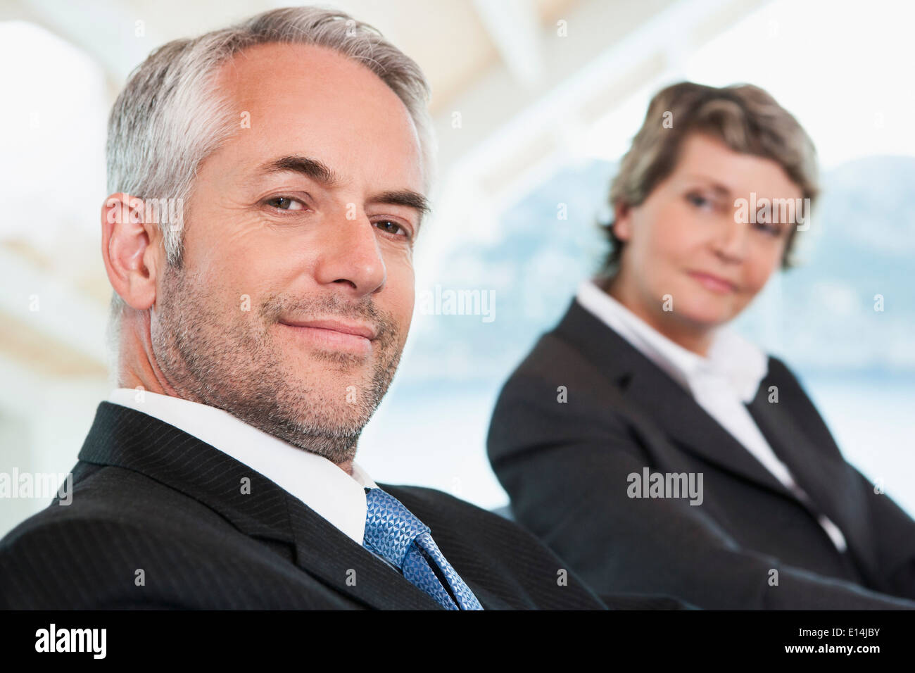 Business people sitting in meeting Stock Photo - Alamy