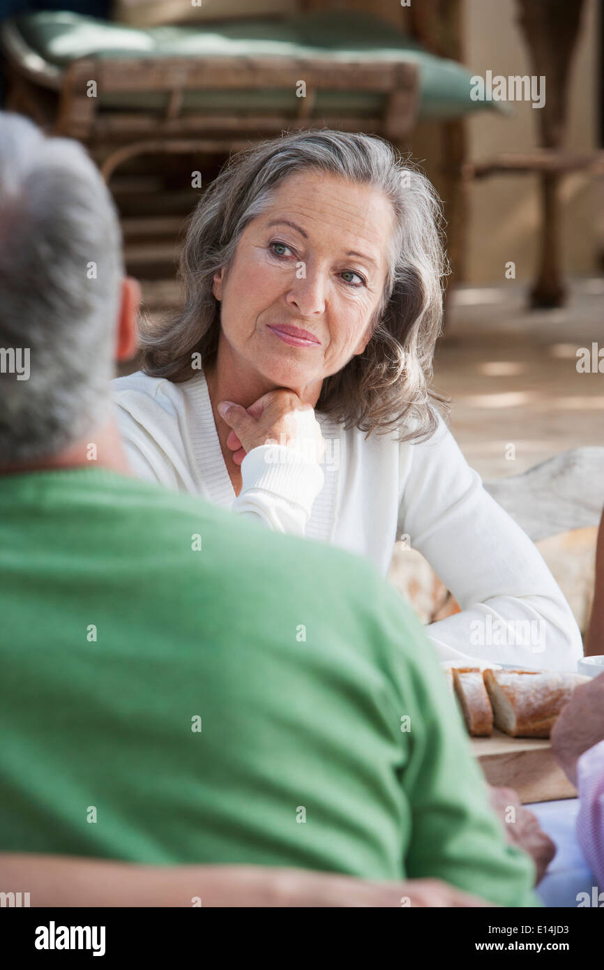 Couple talking outdoors Stock Photo - Alamy