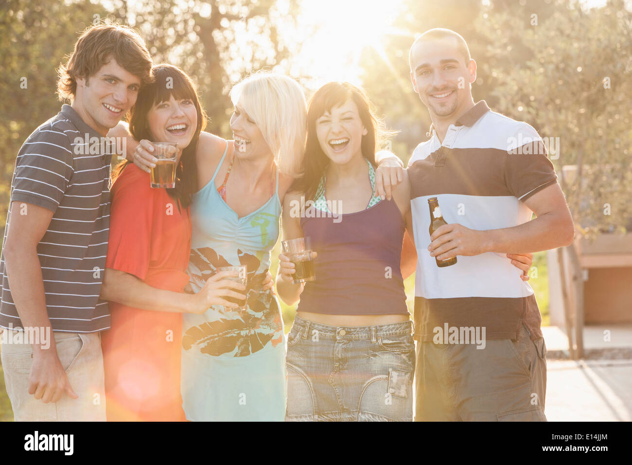 Friends drinking together at party Stock Photo - Alamy