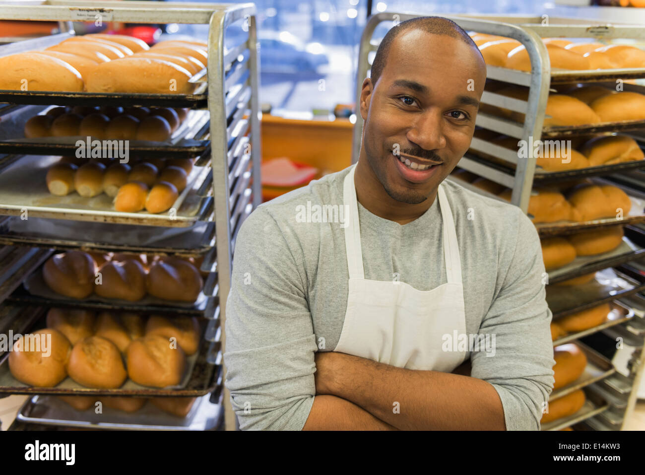 Black baker working in commercial kitchen Stock Photo - Alamy