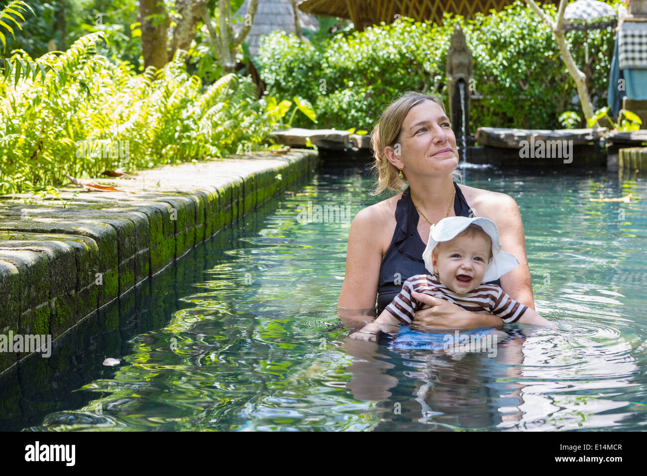 Baby and mother in indonesia hi-res stock photography and images - Alamy