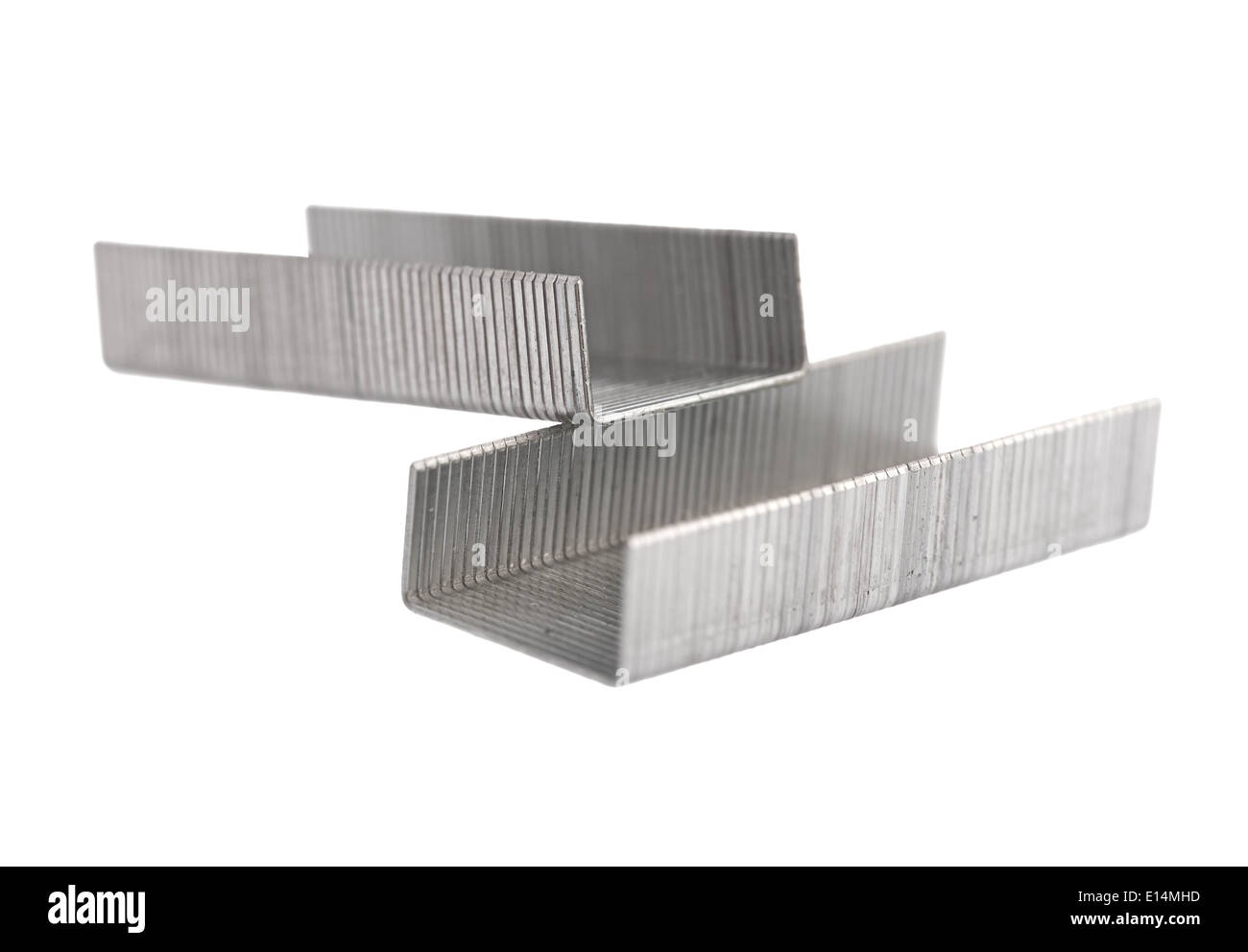 staples stack isolated on a white background Stock Photo - Alamy