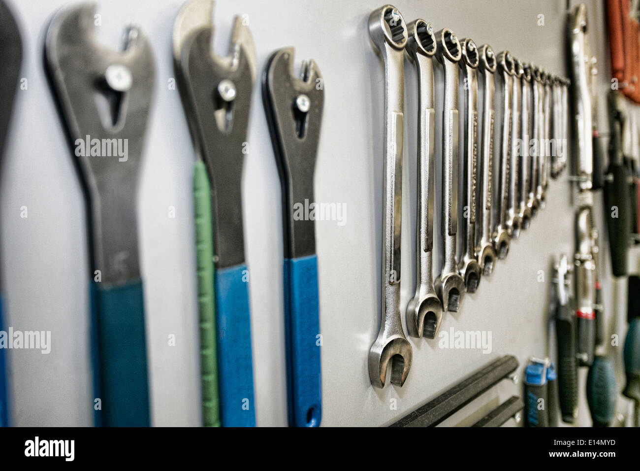 Tools arranged neatly on shop wall Stock Photo - Alamy