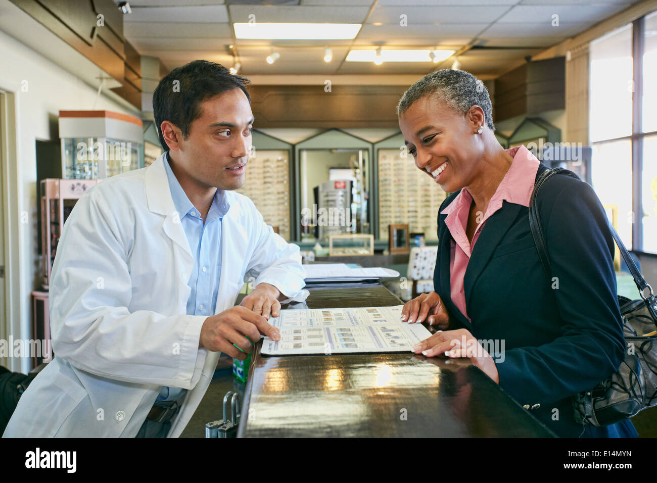 Optometrist with patient hi-res stock photography and images - Alamy