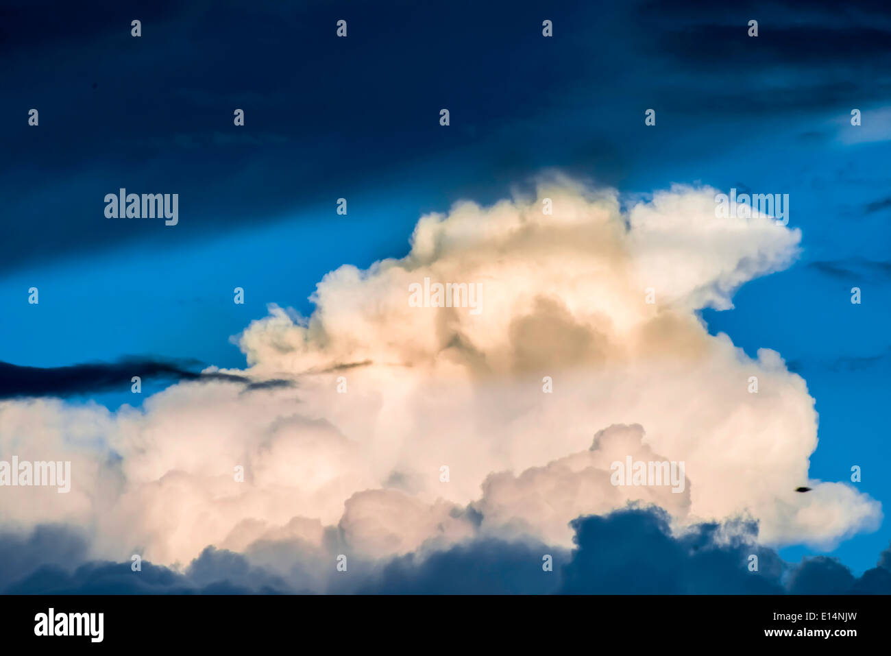 Dramatic clouds and deep blue sky. Sunset Stock Photo - Alamy
