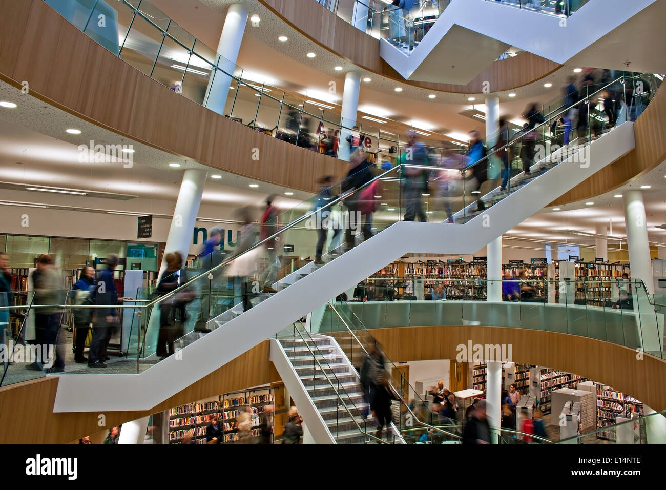 People climbing stairs inside Liverpool's Central Library Stock Photo ...