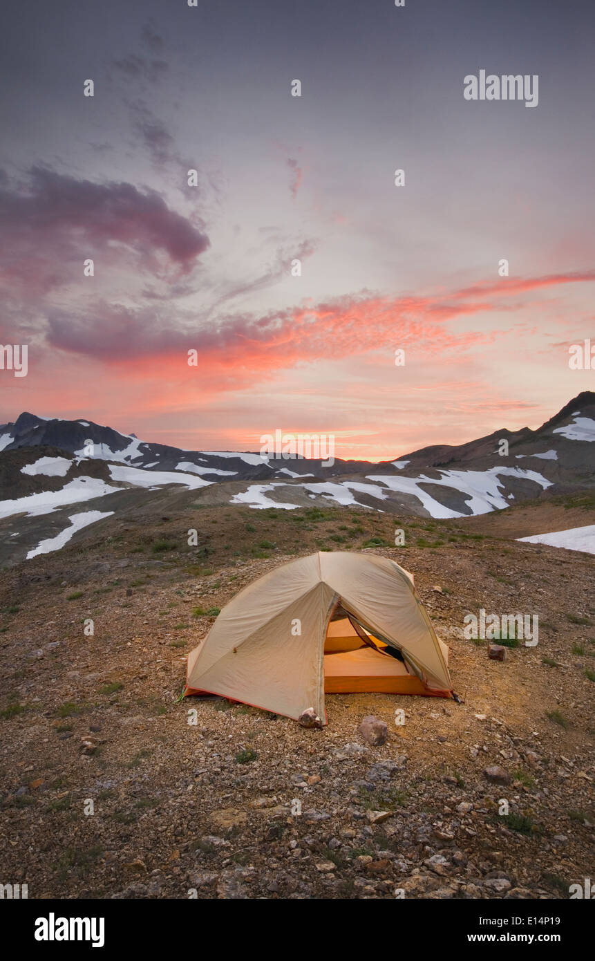 Tent at campsite in snowy mountain landscape Stock Photo - Alamy