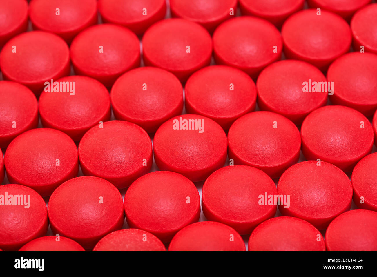 A lot of red pills background Stock Photo - Alamy