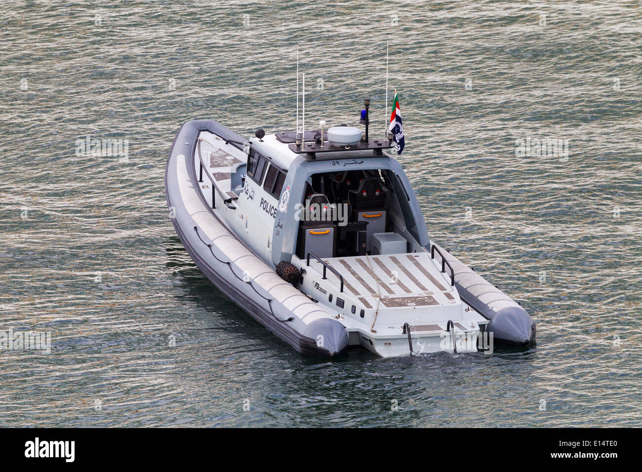 Police Launch in Muscat harbour, Oman Stock Photo - Alamy