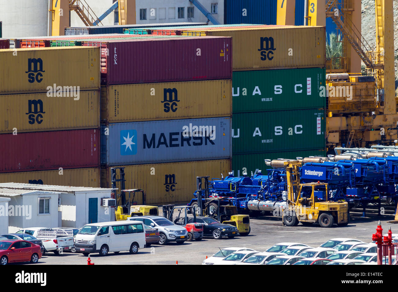 Containers stacked on the Quay at Muscat, Oman Stock Photo - Alamy
