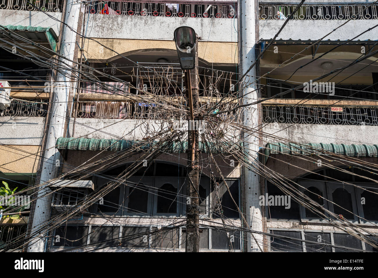 Tangled cables, power lines, Yangon or Rangoon, Yangon Region, Myanmar ...