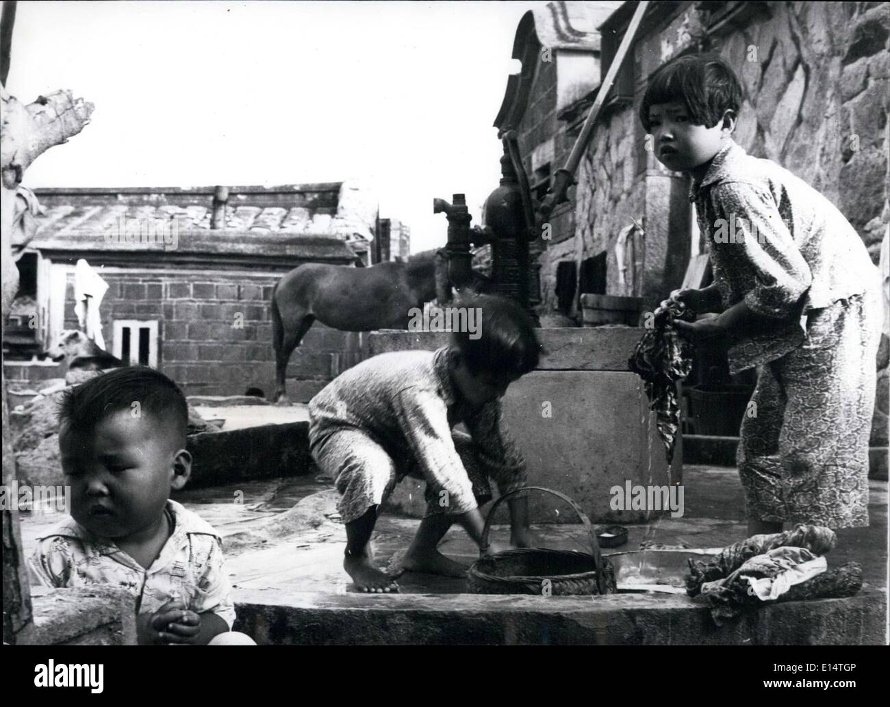 Apr. 18, 2012 - QUEMOY The Community Laundry: Children wash their ...