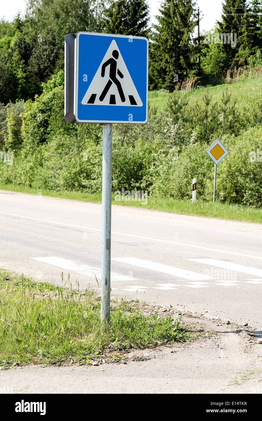 Road sign with zebra pattern pedestrian crossing Stock Photo - Alamy