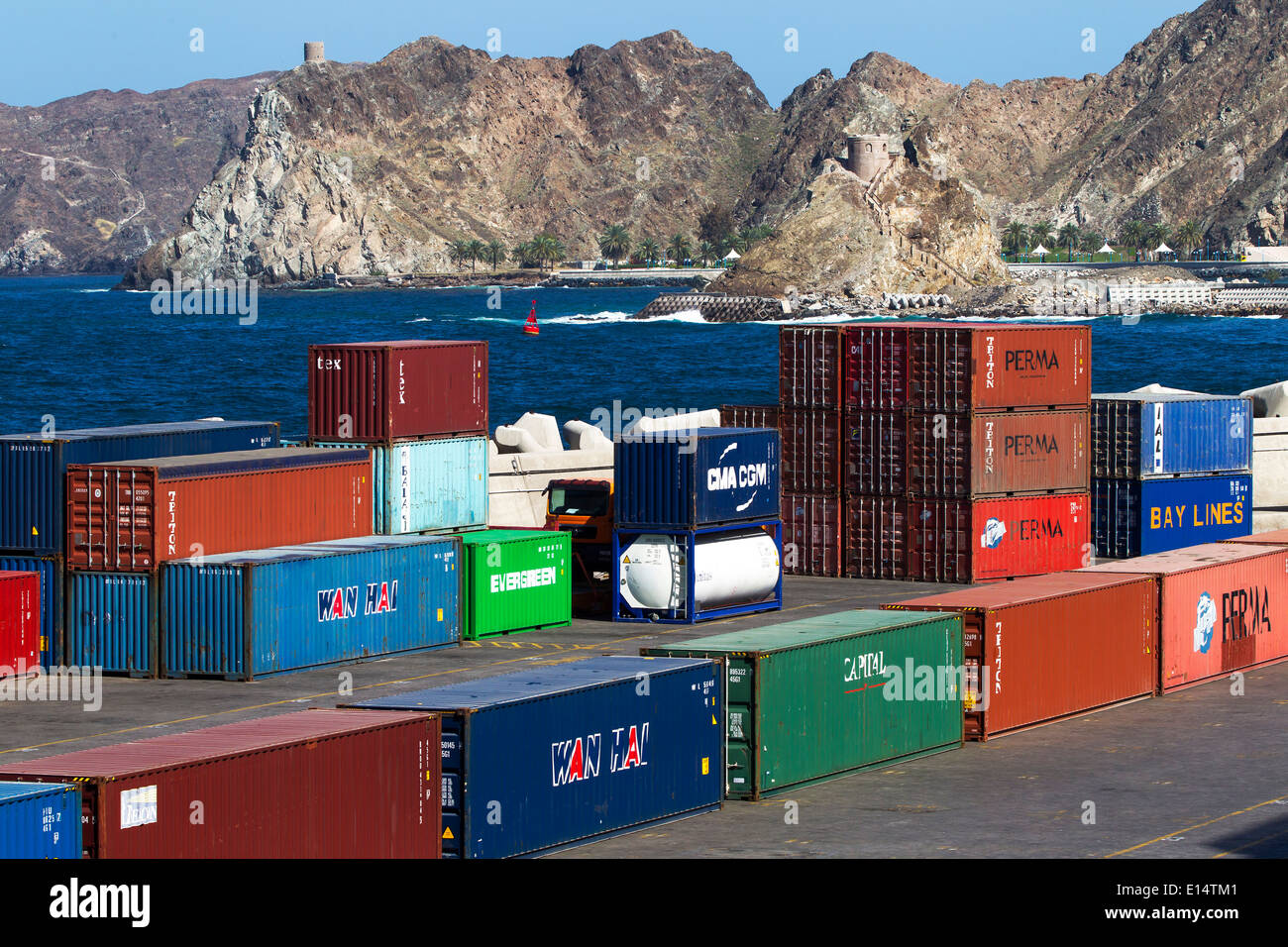 Containers stacked on the Quay at Muscat, Oman Stock Photo - Alamy