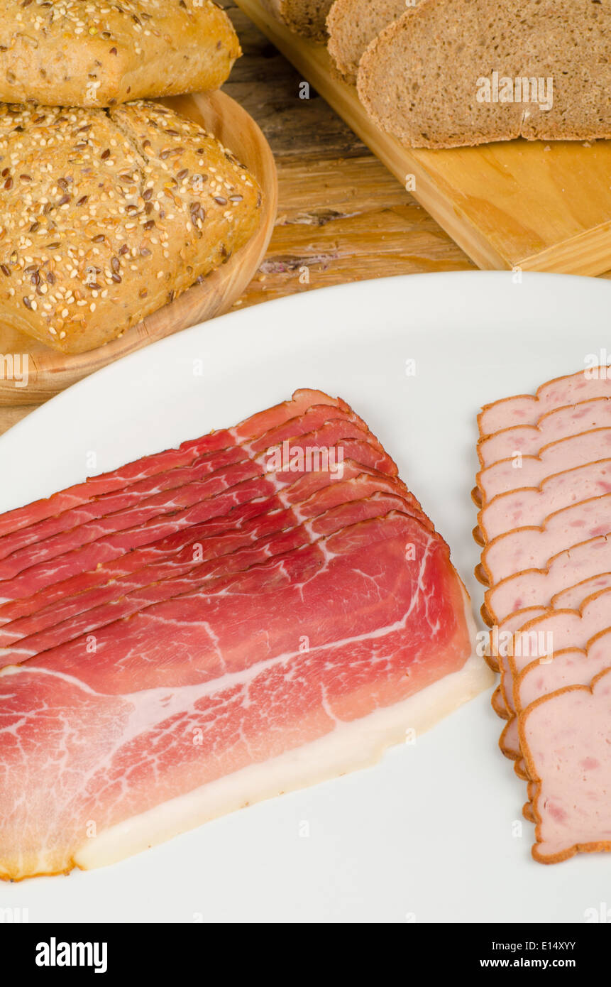 Cold meat and bread, traditional German food Stock Photo - Alamy