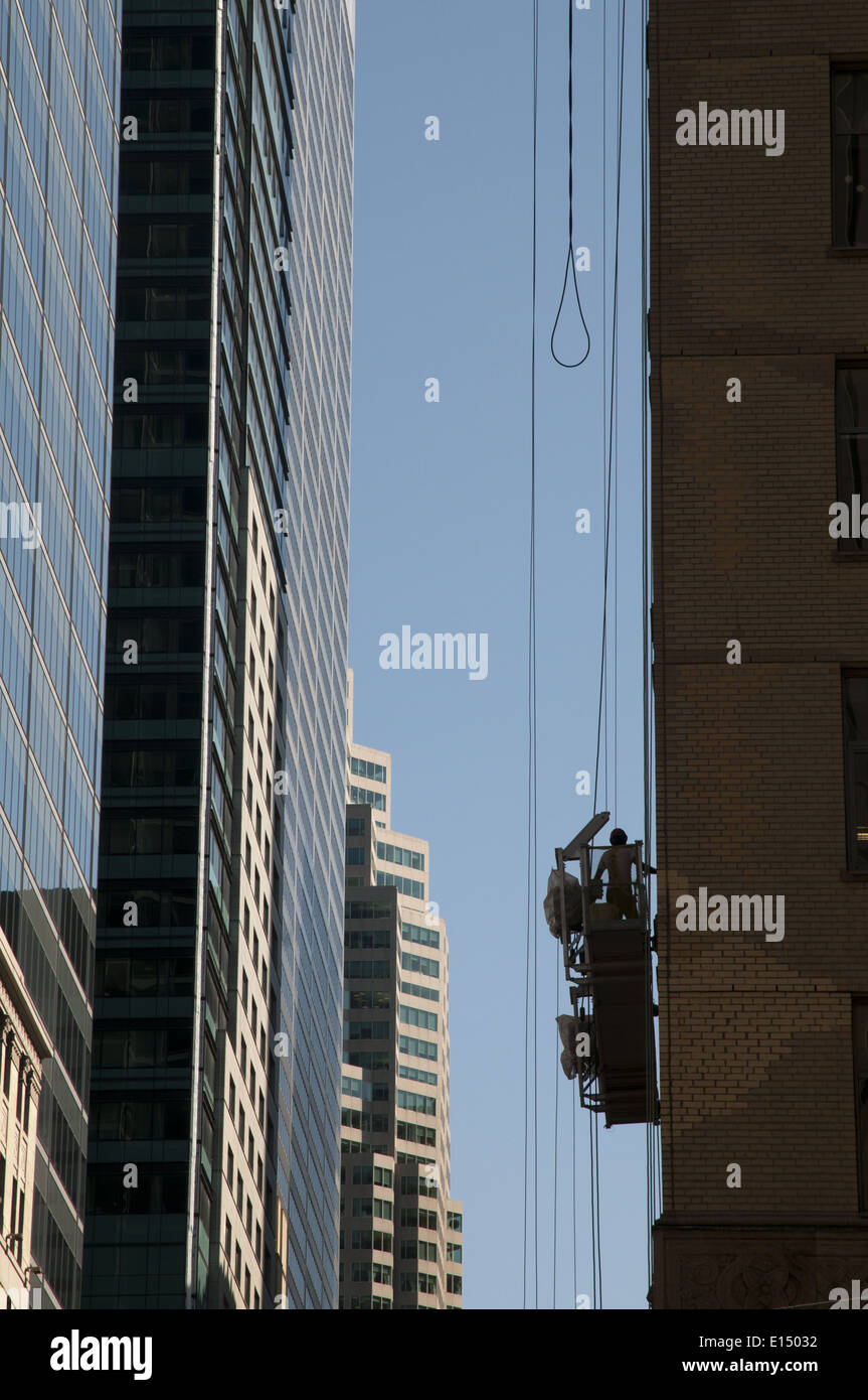 Window cleaners in action on one of the financial district's office ...