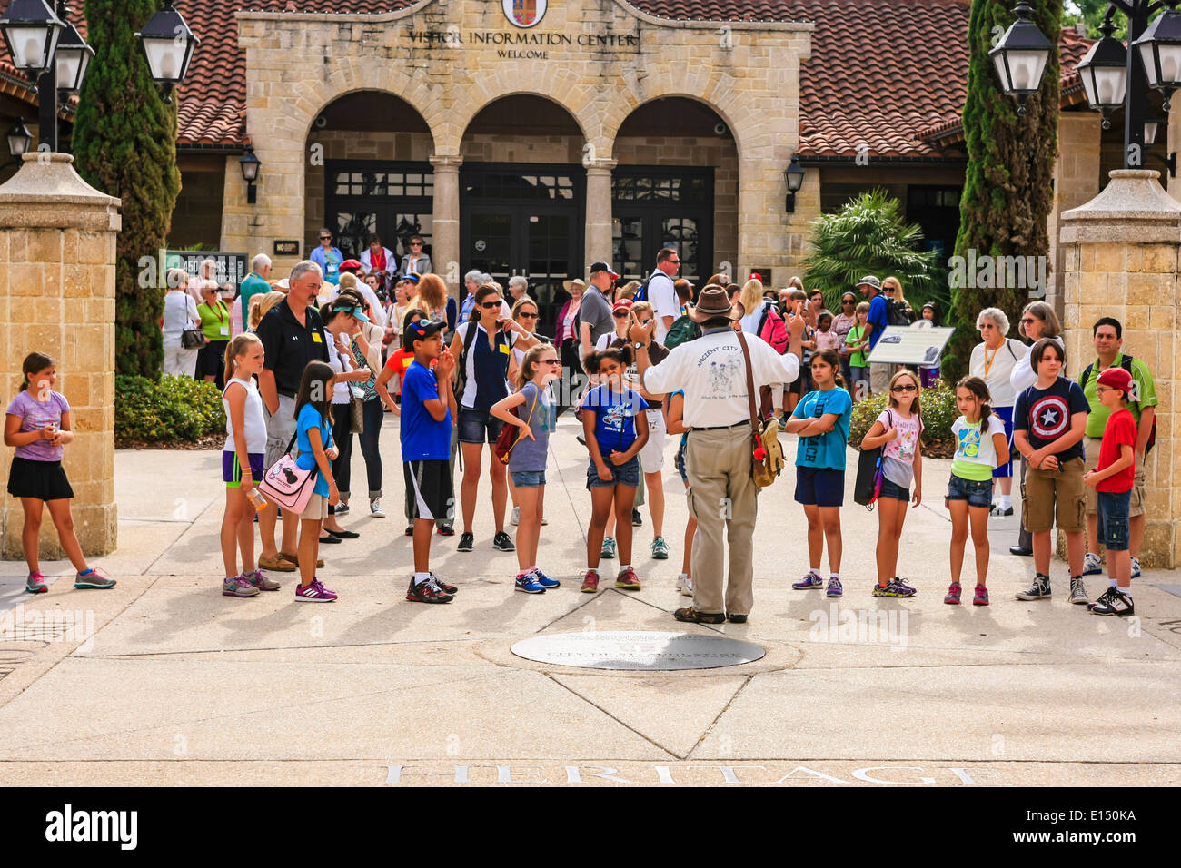 School children gather around a tour guide in St. Augustine FL Stock ...