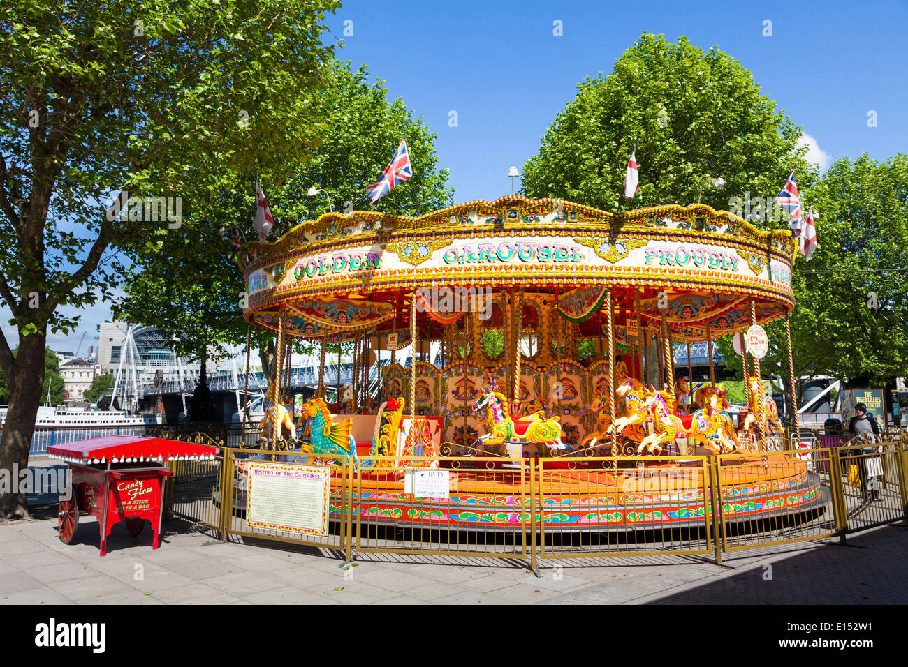 Unoccupied traditional carousel fair ground ride Stock Photo - Alamy
