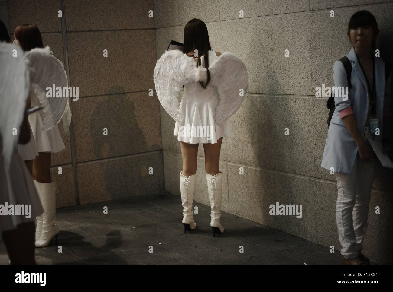 Kuala Lumpur, Malaysia. 22nd May, 2014. A Models dress like angel eat ...