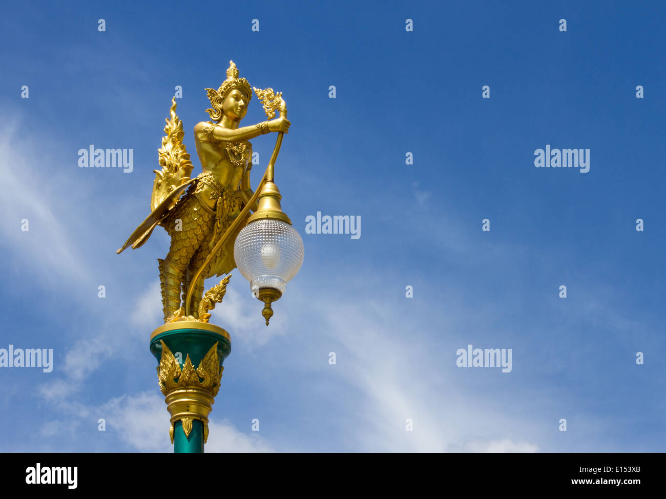 Thai art and Thai style street lamp against blue sky Stock Photo - Alamy