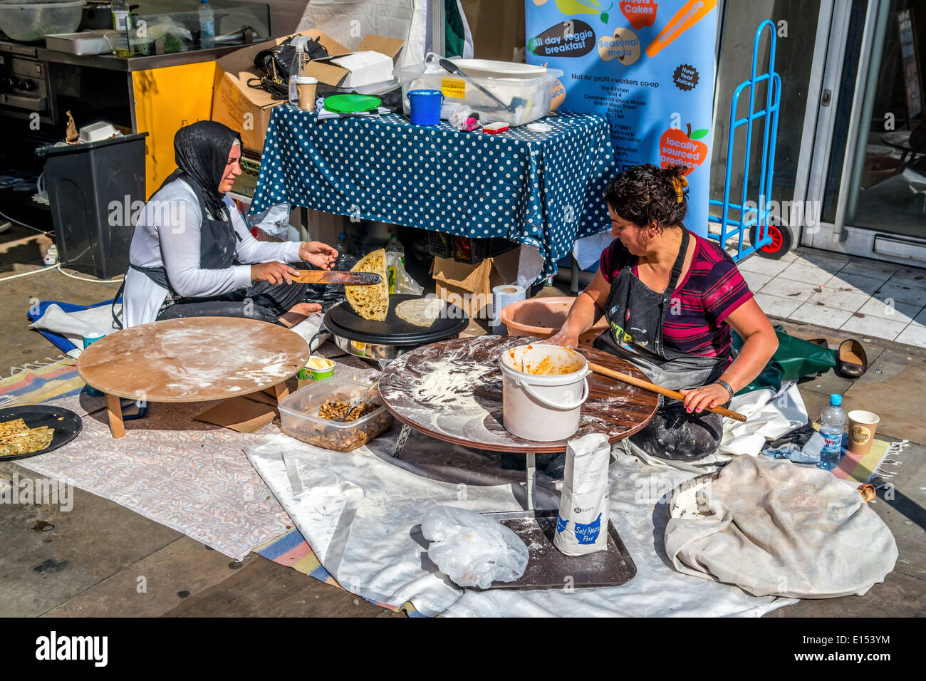 Asian ladies making naan bread hi-res stock photography and images - Alamy