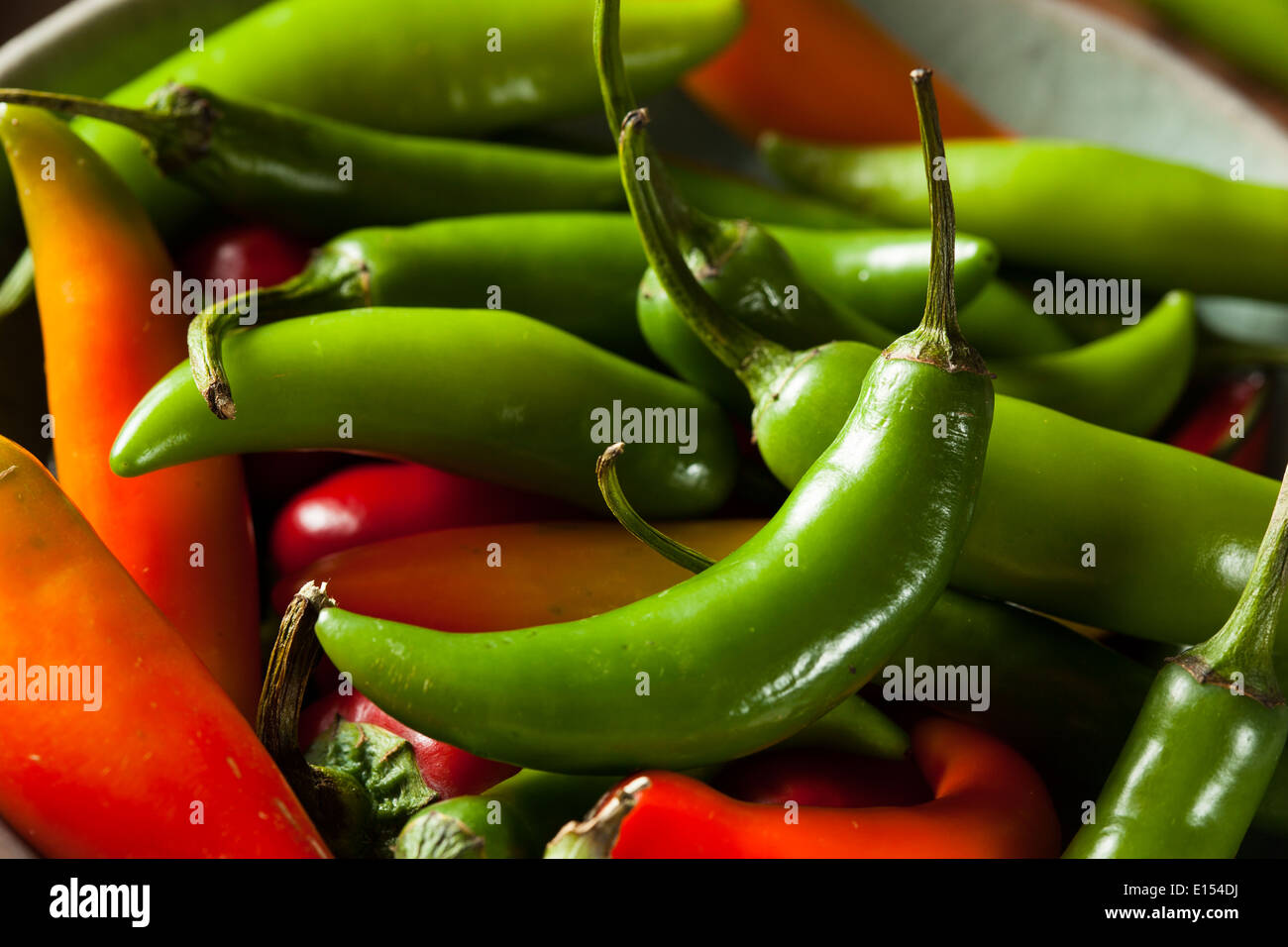 Organic Green Spicy Serrano Peppers on a Background Stock Photo - Alamy
