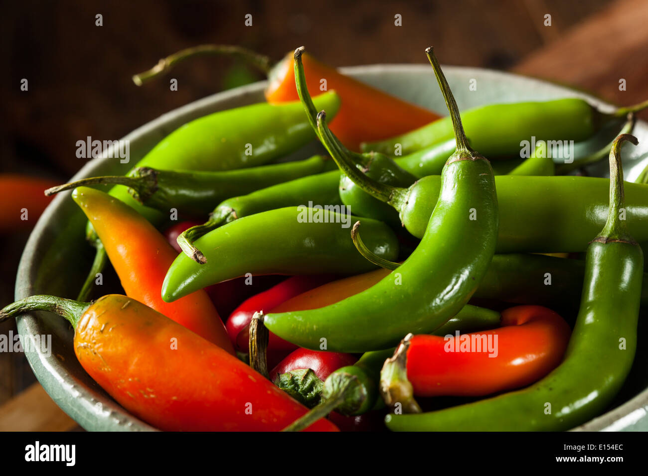 Organic Green Spicy Serrano Peppers on a Background Stock Photo - Alamy