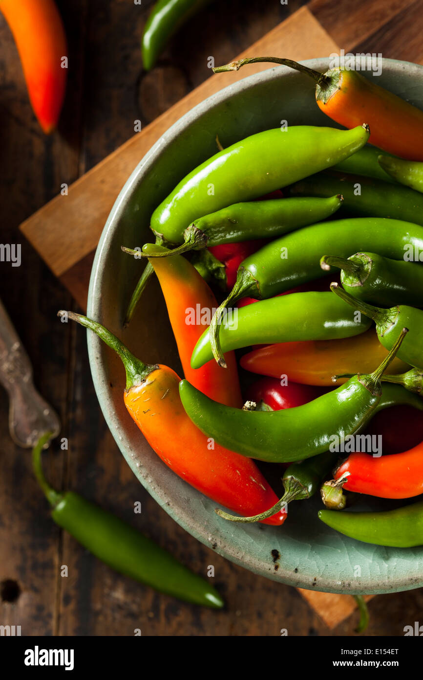 Organic Green Spicy Serrano Peppers on a Background Stock Photo - Alamy