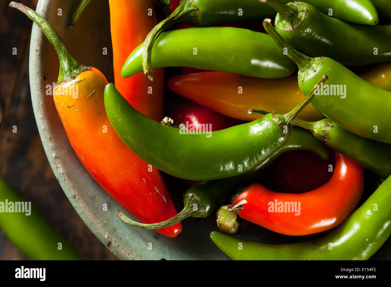 Organic Green Spicy Serrano Peppers on a Background Stock Photo - Alamy