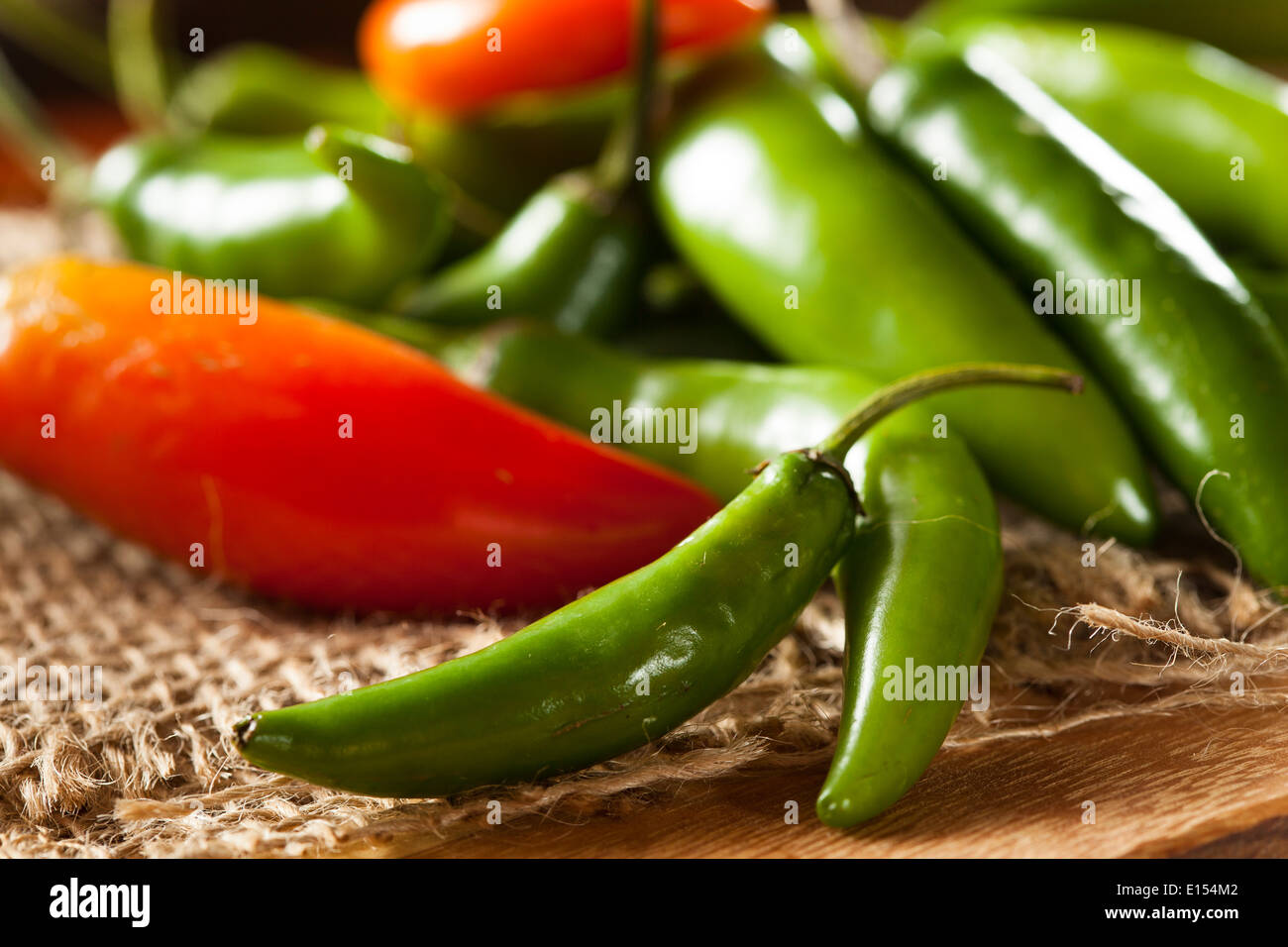 Organic Green Spicy Serrano Peppers on a Background Stock Photo - Alamy