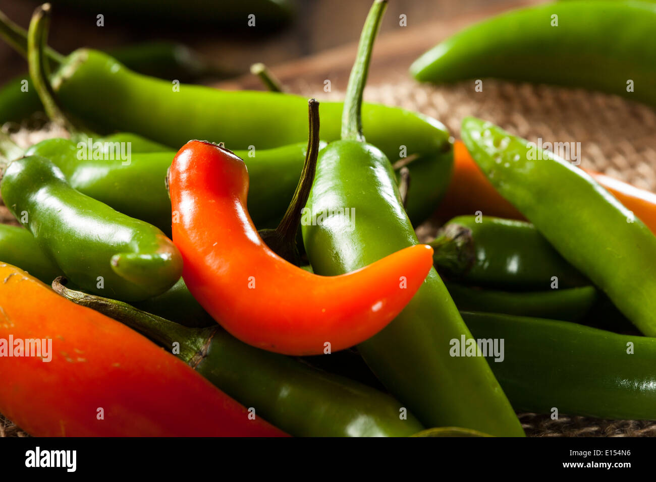 Organic Green Spicy Serrano Peppers on a Background Stock Photo - Alamy