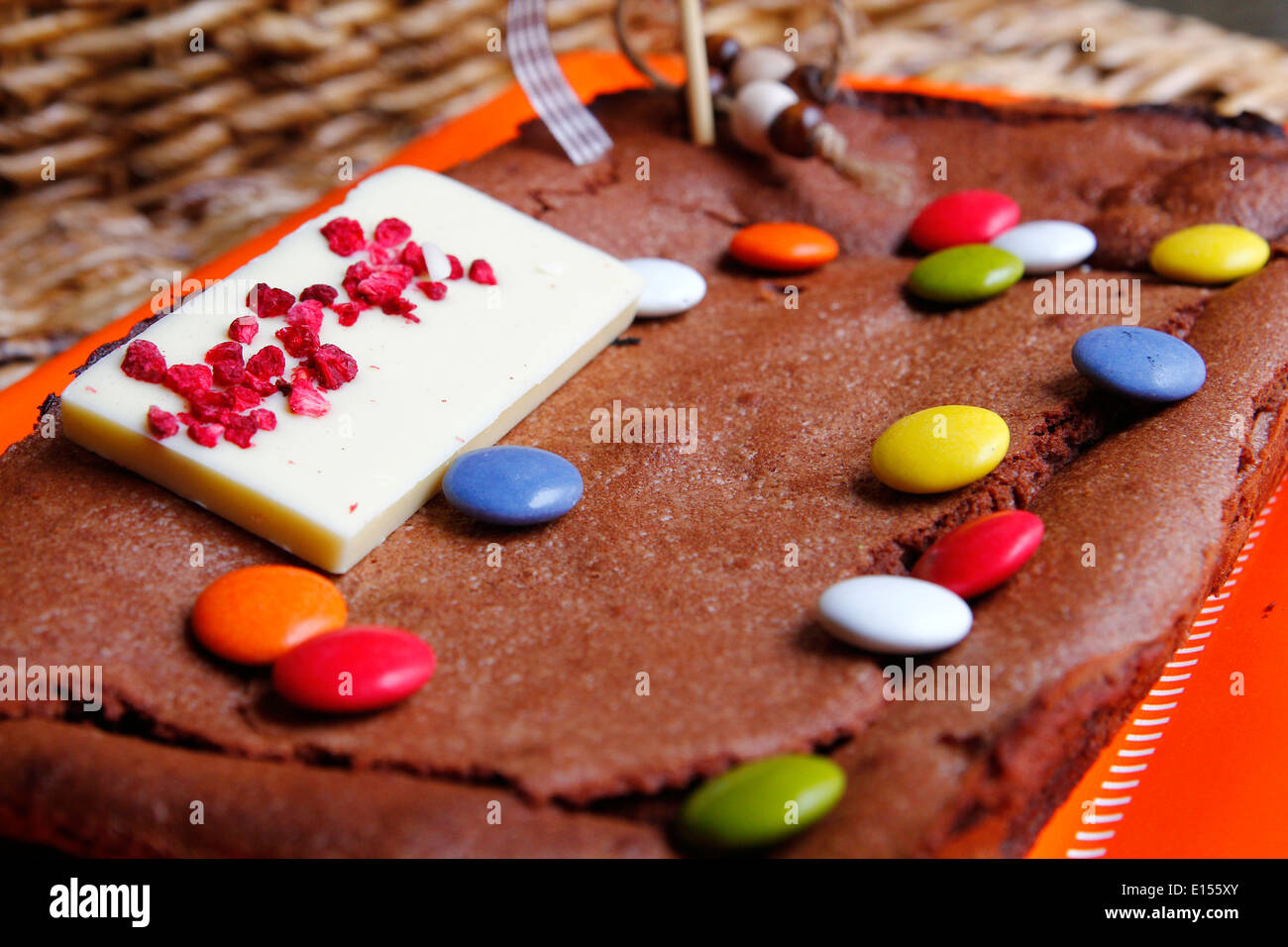 Chocolate dessert with colorful sweets Stock Photo - Alamy