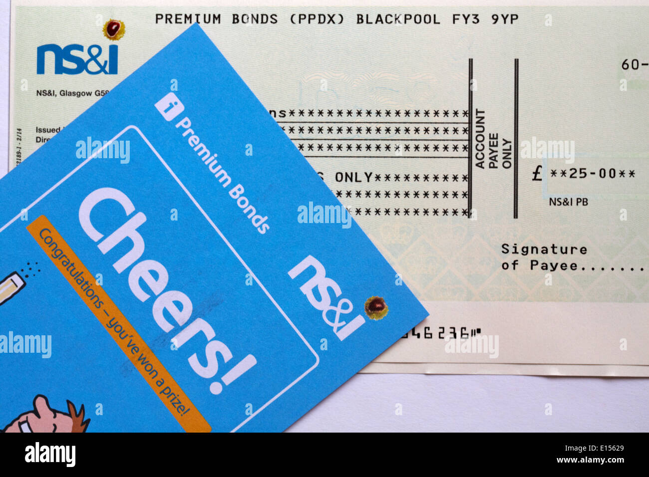 Premium Bonds winnings - cheque for £25 cheers from NS&I Stock Photo ...