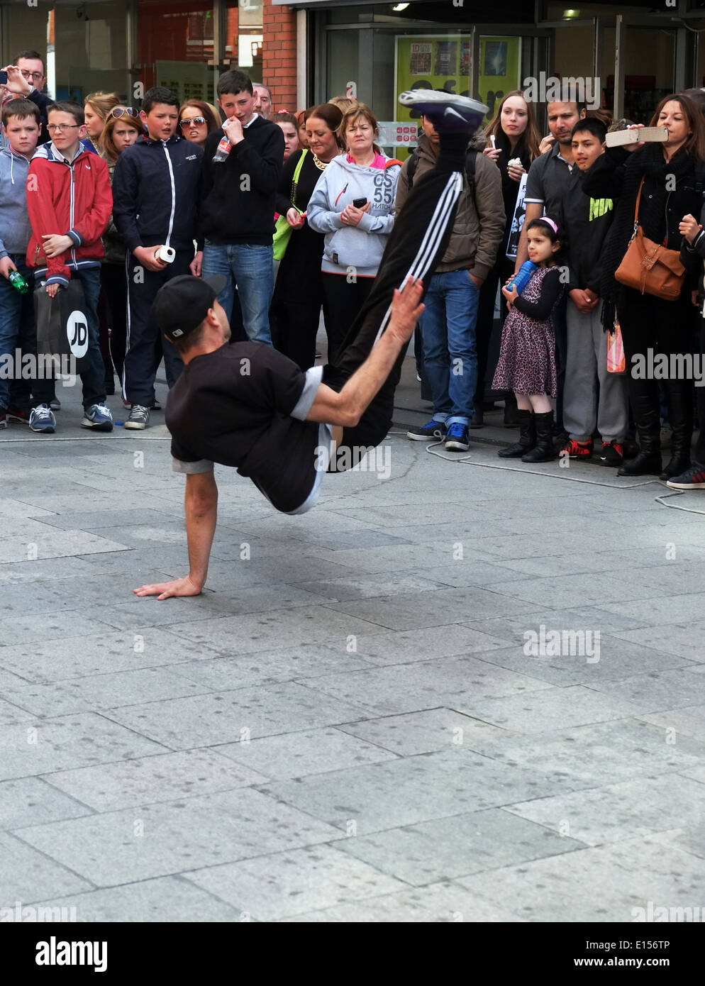 Break dancer performing in Dublin's Henry Street Stock Photo - Alamy