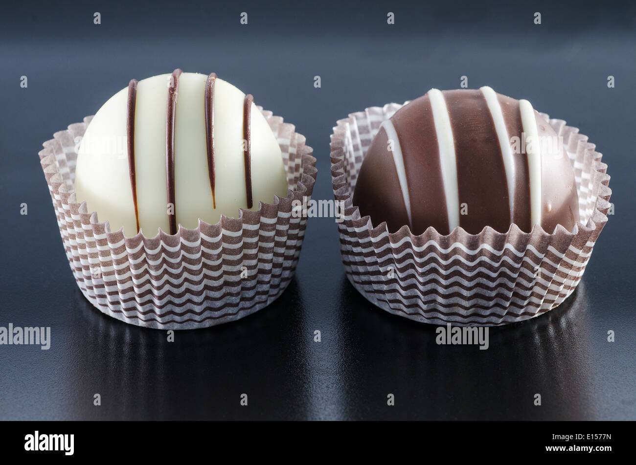 two chocolate pralines Stock Photo - Alamy