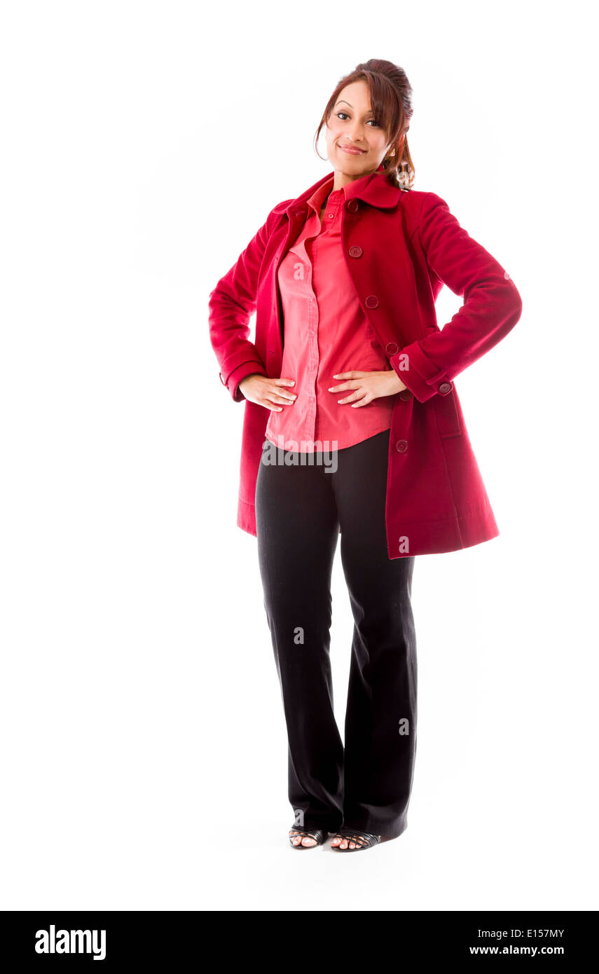 Indian young woman standing with her arms akimbo Stock Photo - Alamy